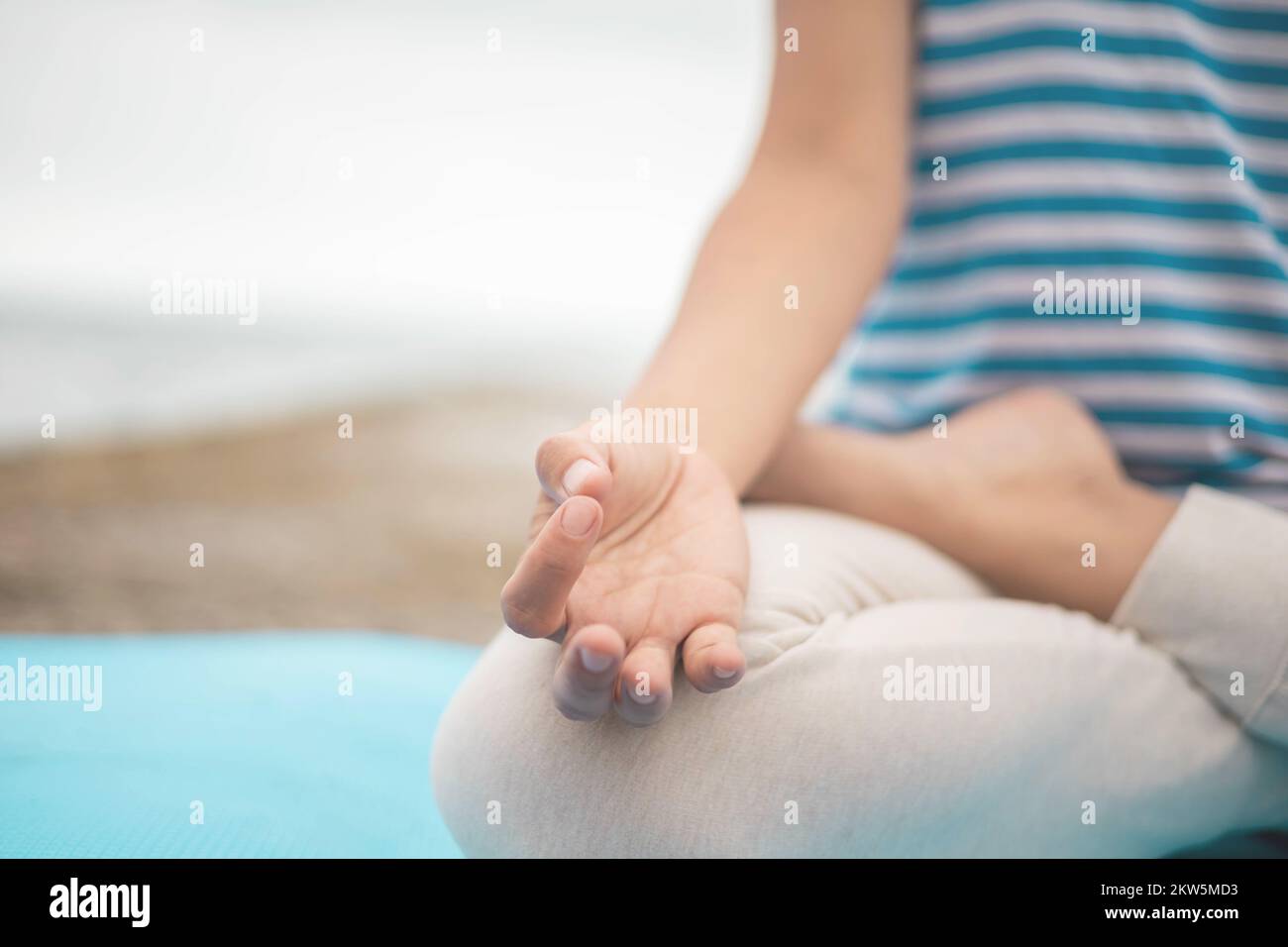Closeup female yoga hands mudra fingers connected lotus position ...