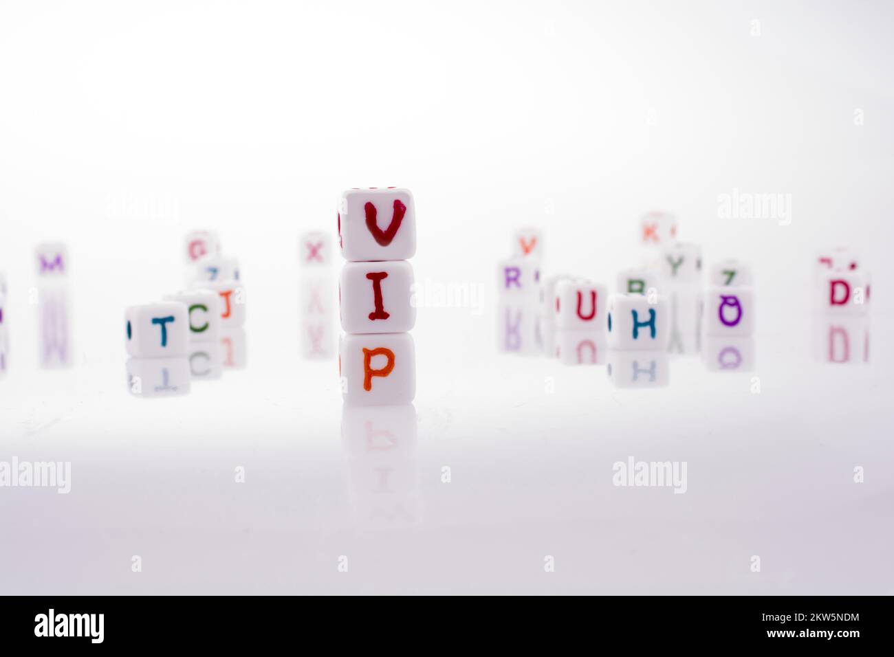 Alphabet blocks and the word VIP on a white background Stock Photo - Alamy