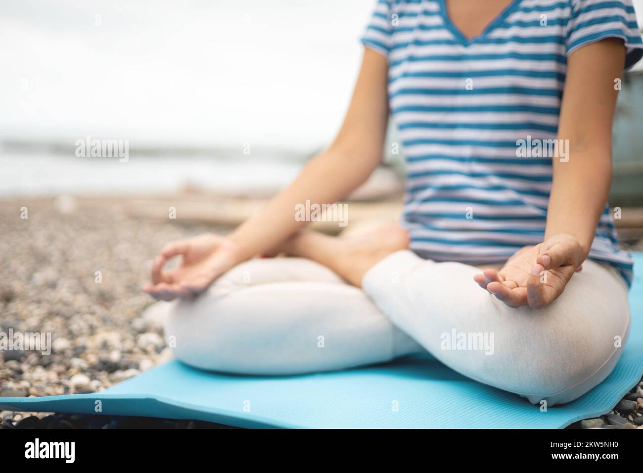 Closeup female yoga hands mudra fingers connected lotus position ...