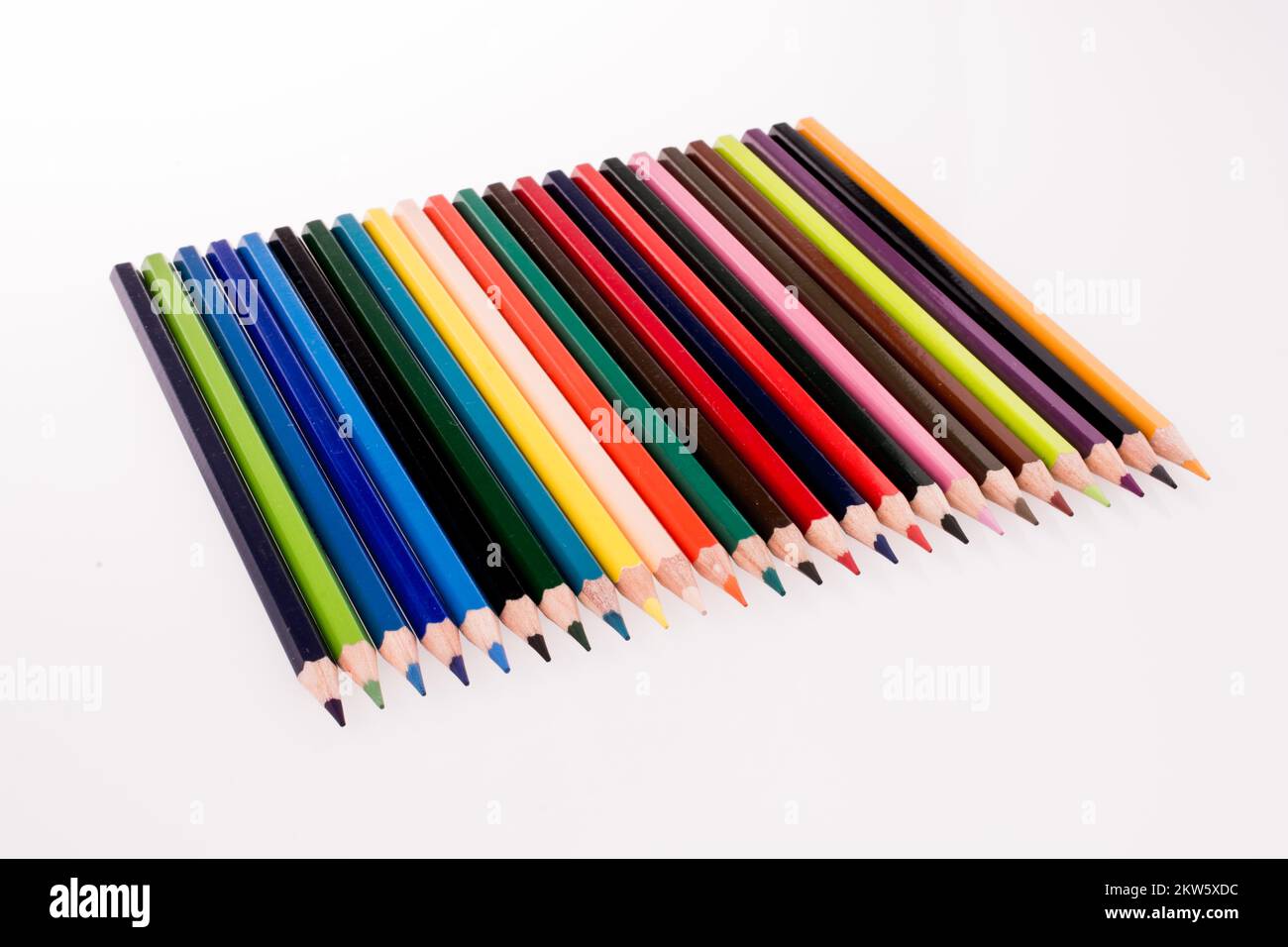 Color pencils of various color on a white background Stock Photo - Alamy