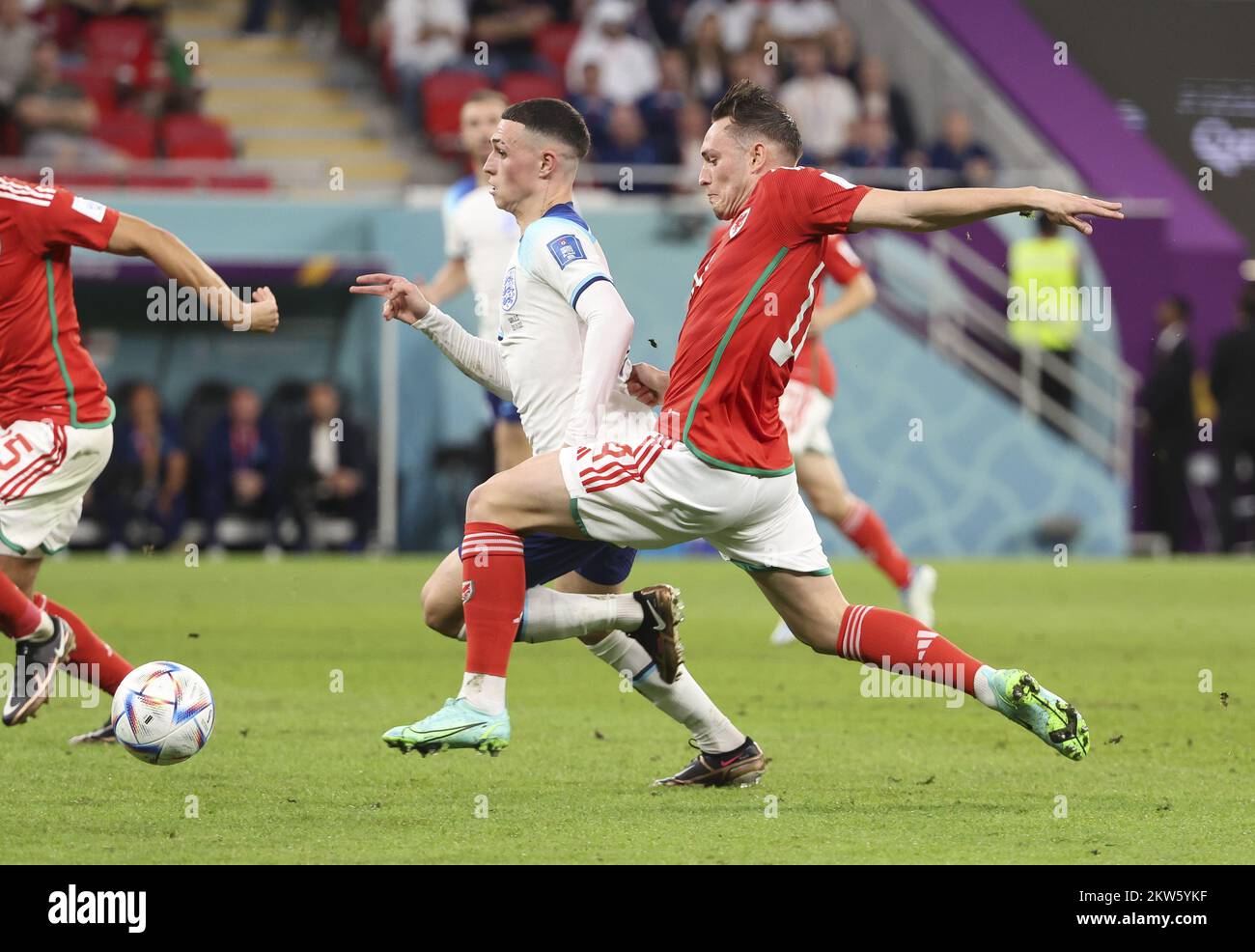Phil Foden of England, Connor Roberts of Wales during the FIFA World ...