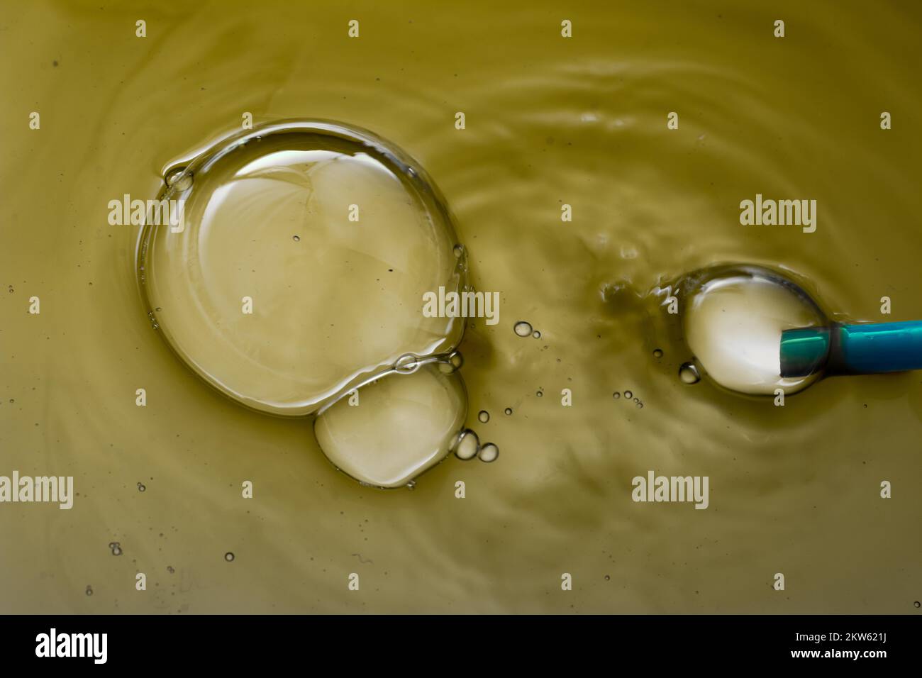 Colorful water bubles on water as abackground Stock Photo - Alamy