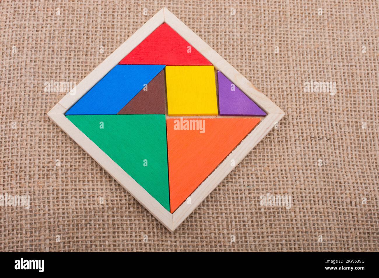 Colorful pieces of a square tangram puzzle Stock Photo - Alamy