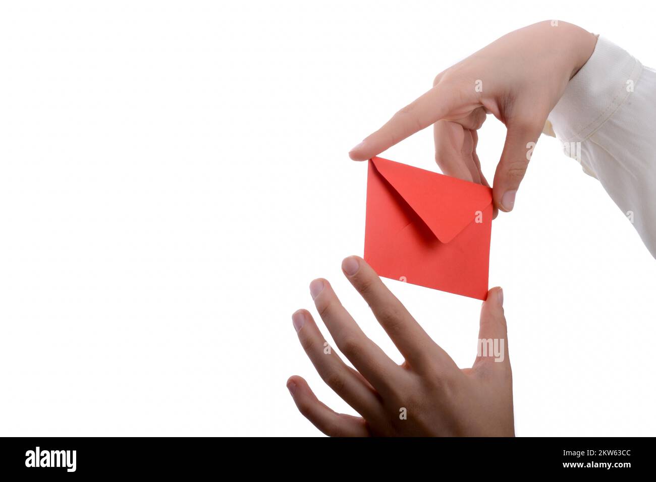 Hand holding a red envelope on a white background Stock Photo - Alamy