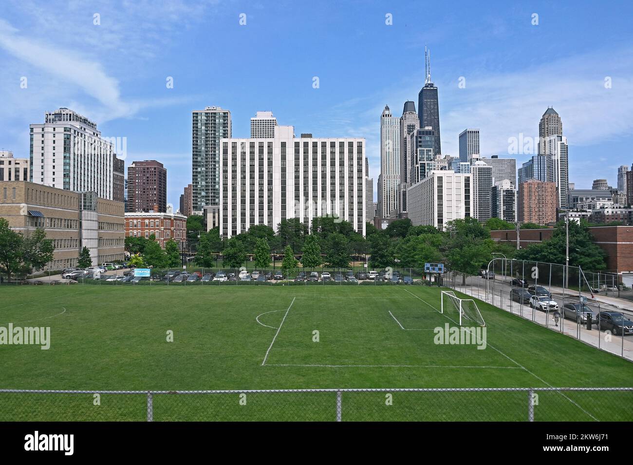 View of a football field and downtown from The Loop elevated railway in ...