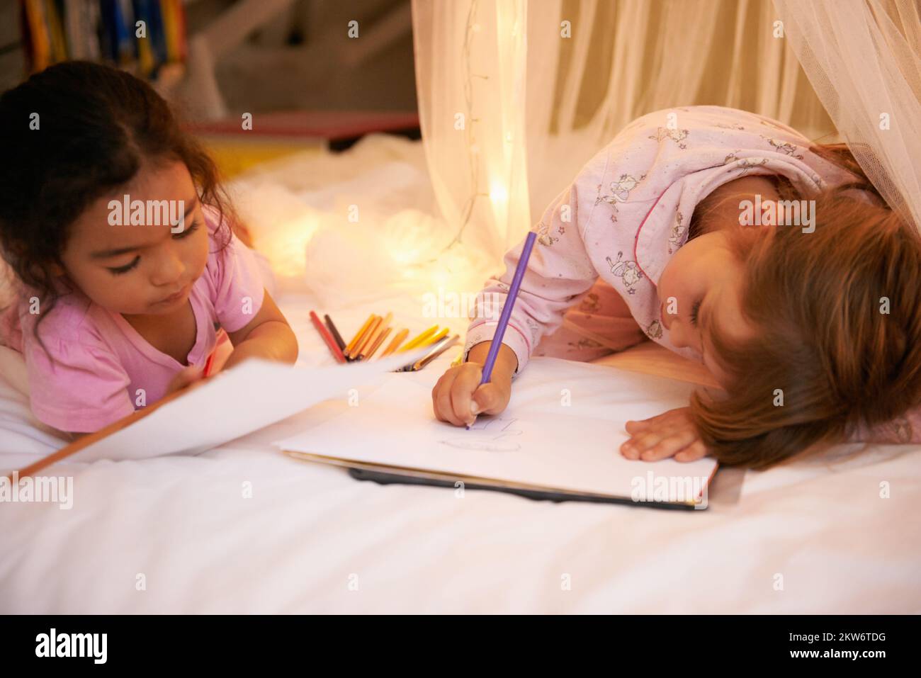 I LOVE sleepovers. cute little girls having a sleepover Stock Photo - Alamy