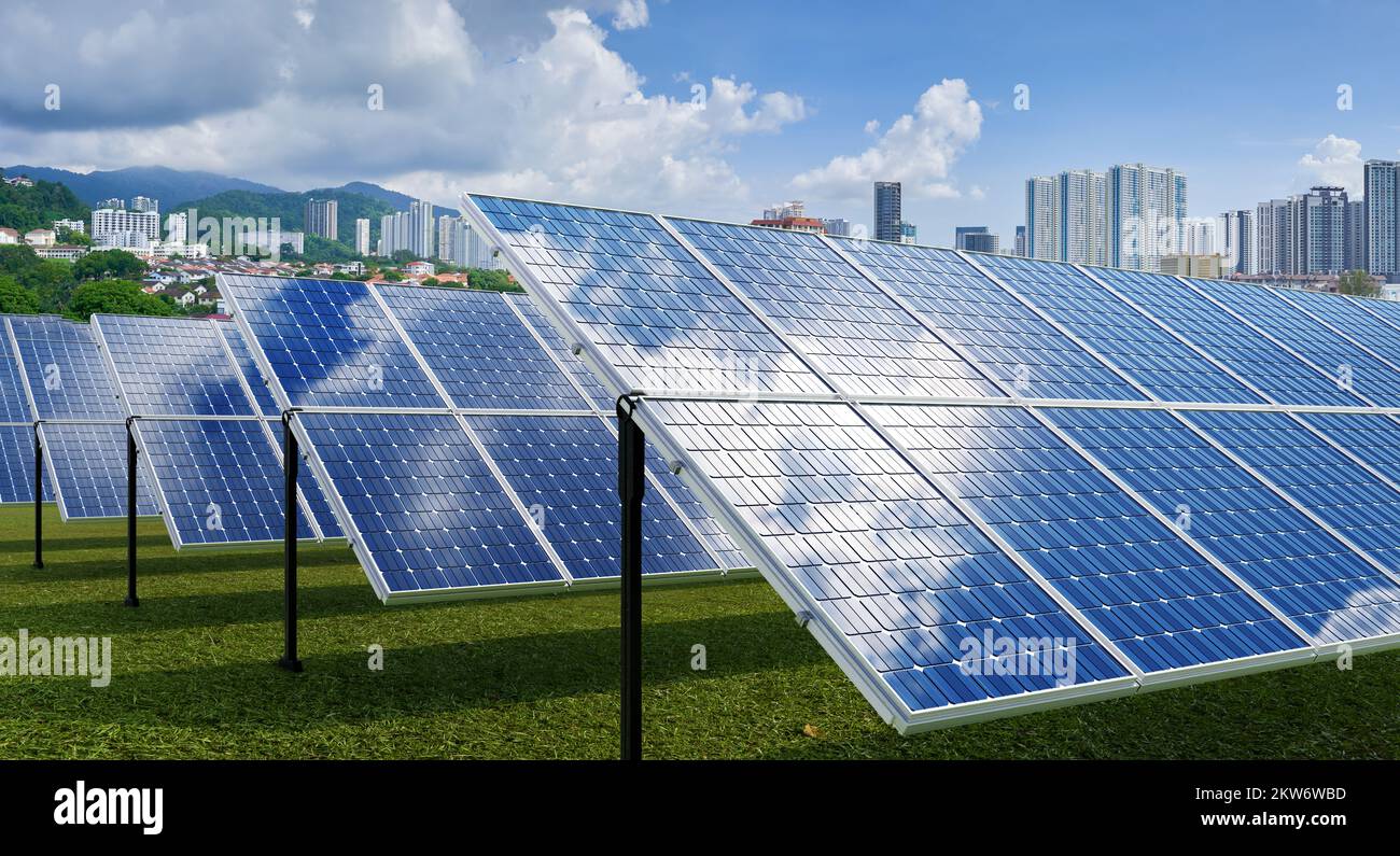 Solar panels with modern city. Clean, green, alternative and renewable ...