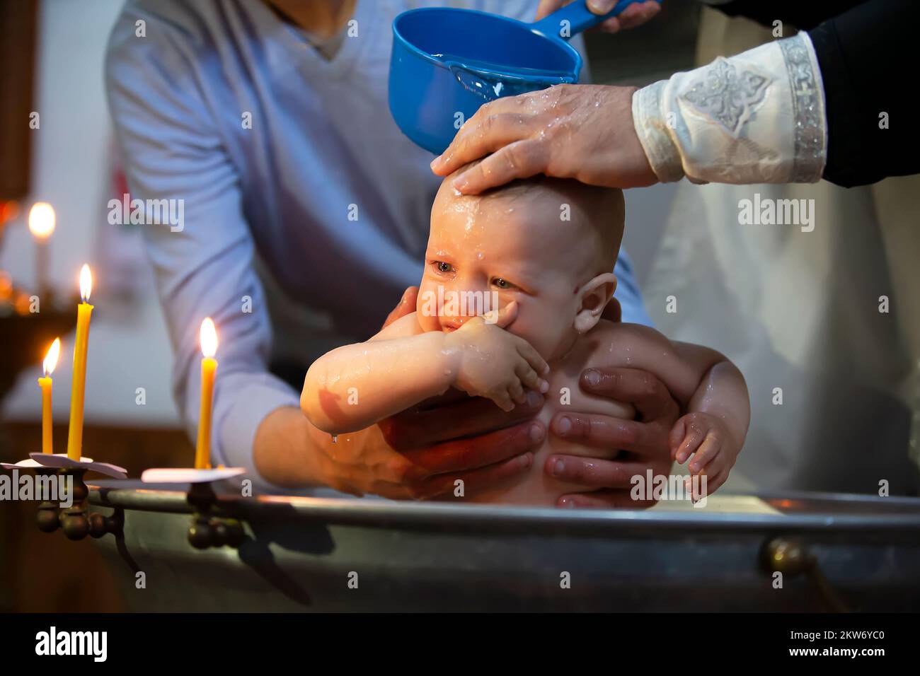 The rite of the Orthodox baptism of an infant Stock Photo - Alamy