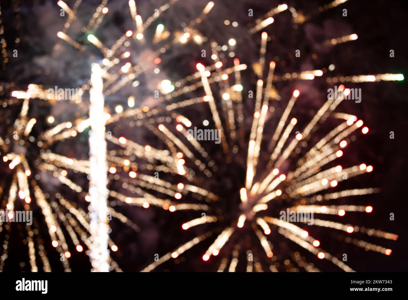 On a black background bokeh from explosions of colorful fireworks Stock ...