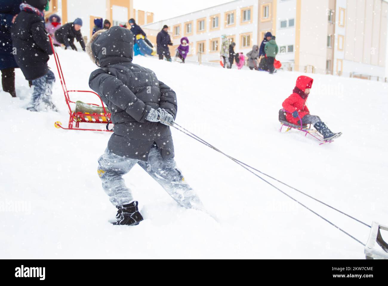 Go sledding hi-res stock photography and images - Alamy
