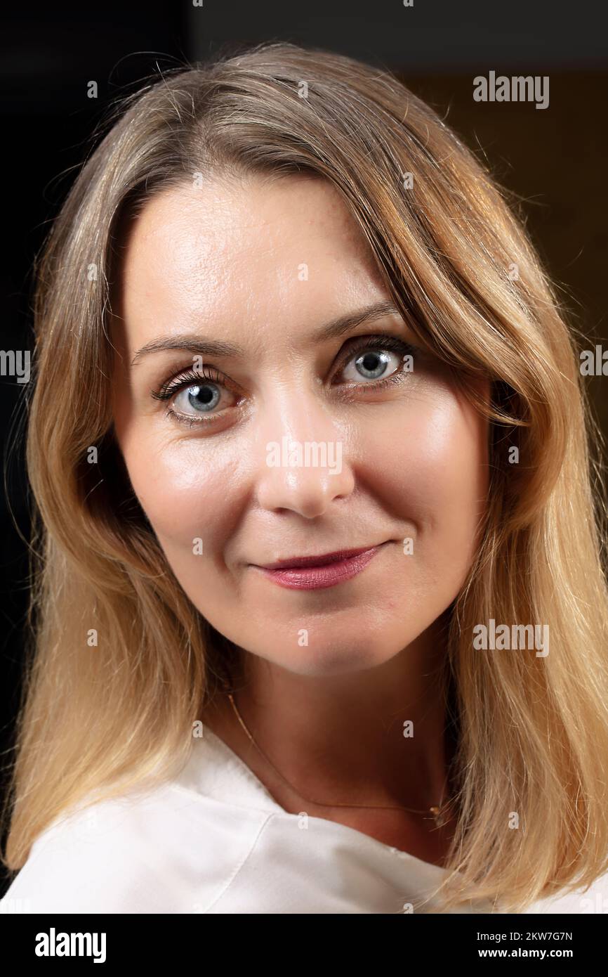 Portrait of a beautiful middle-aged blonde woman Stock Photo - Alamy
