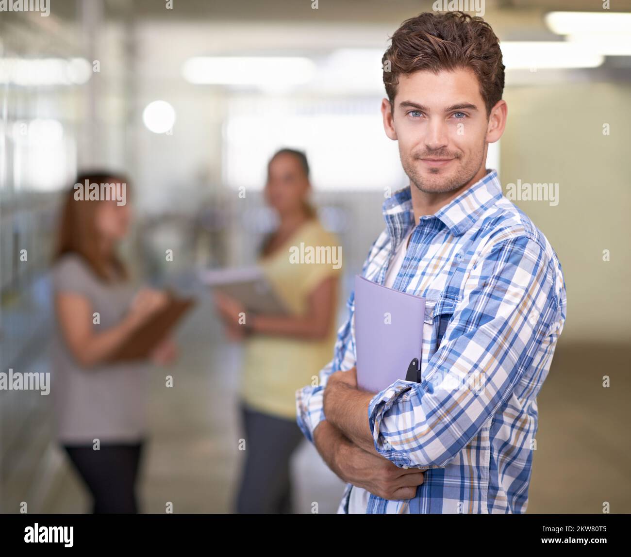 Business is all about planning and commitment. A handsome businessman ...