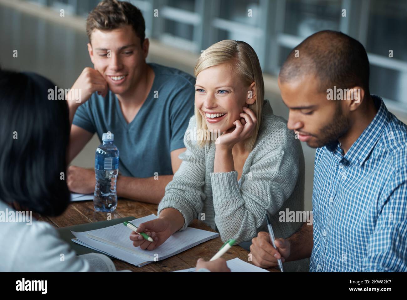 Youre excellent at this. A group of college students sitting together ...