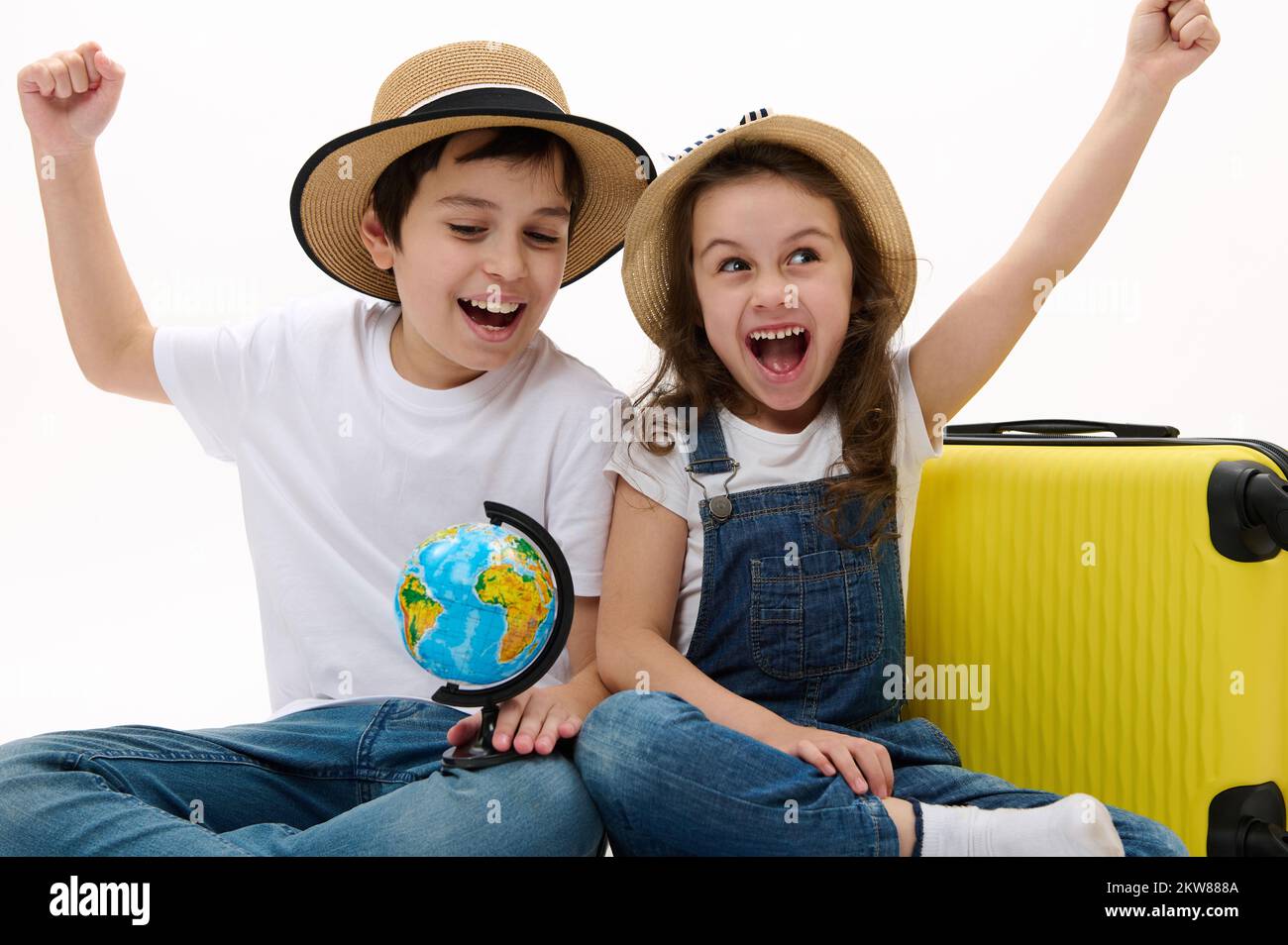 Happy overjoyed kids travelers experiencing happiness while going for ...