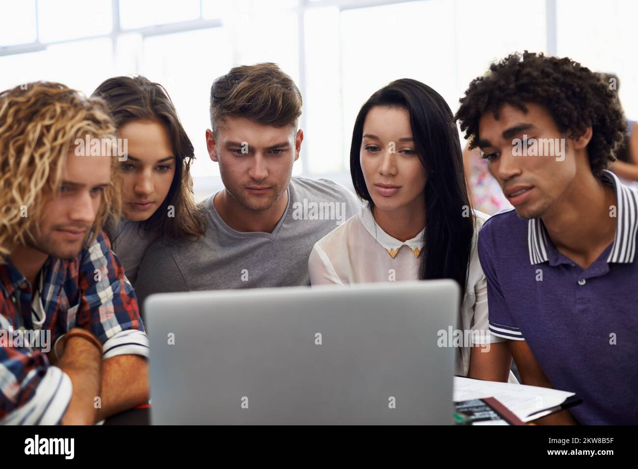 This is interesting. a group of young college students working together ...