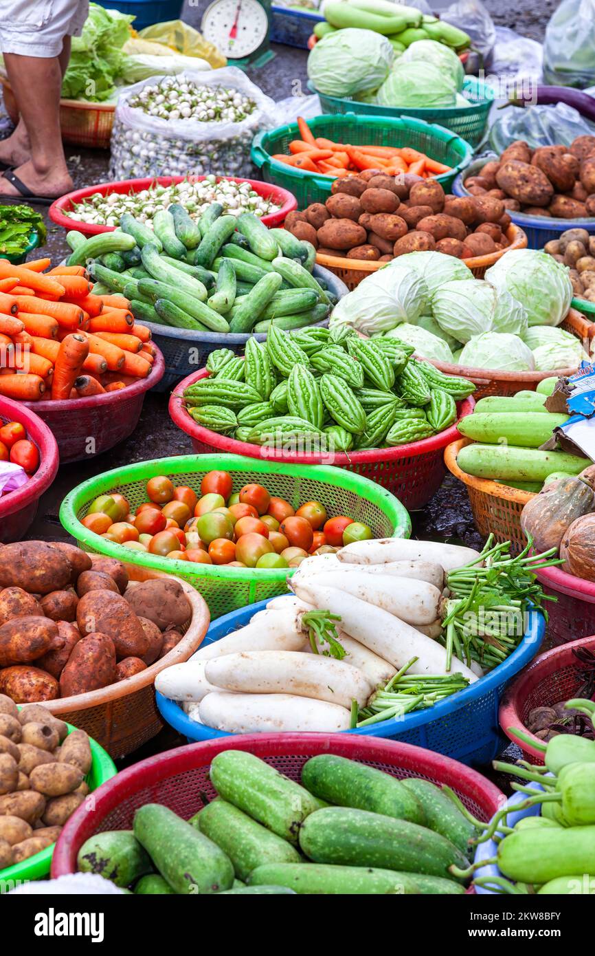 Fruit and vegetables on display in street market, central Ho Chi Minh ...