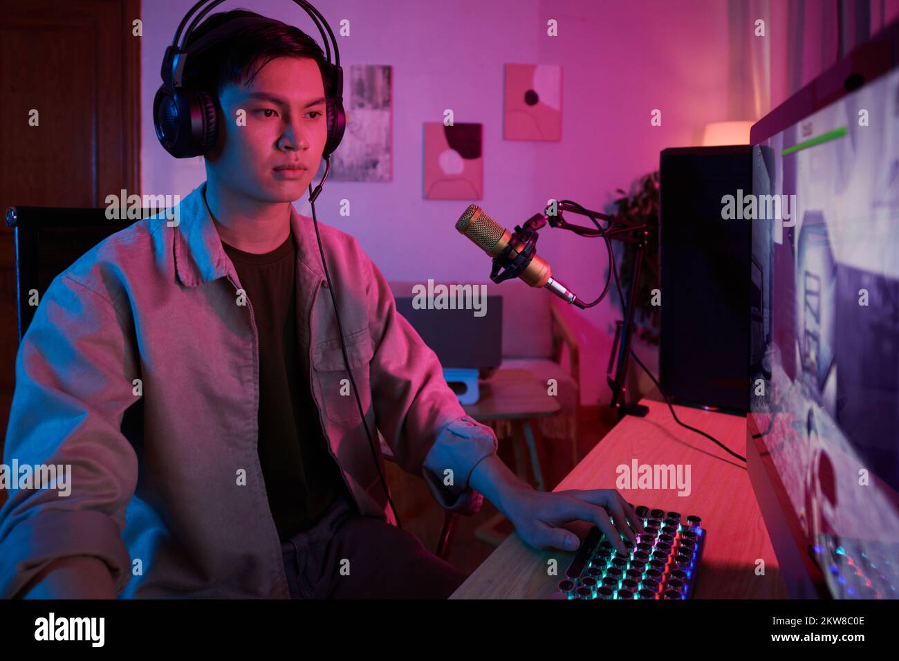 Serious lets player filming himself playing first person shooter Stock ...