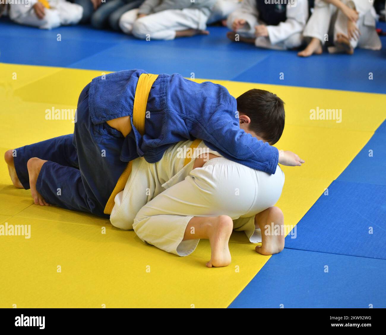 Two Boys judoka in kimono compete on the tatami Stock Photo - Alamy