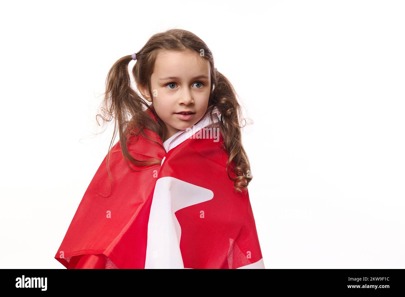 Beautiful Canadian citizen - a little girl wrapping Canadian flag ...