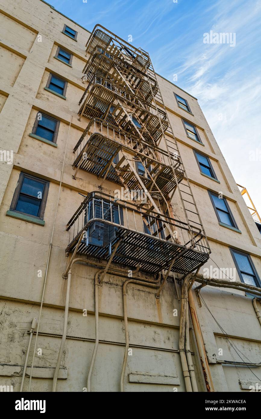 Upward view of the fire escape on the rear wall of a building Stock ...