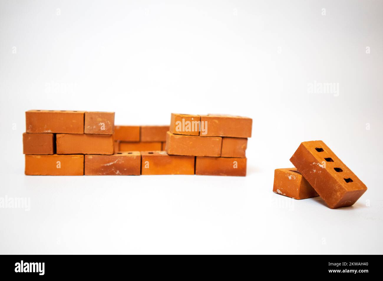 children's clay brick. building a house. a smaller copy of the real ...