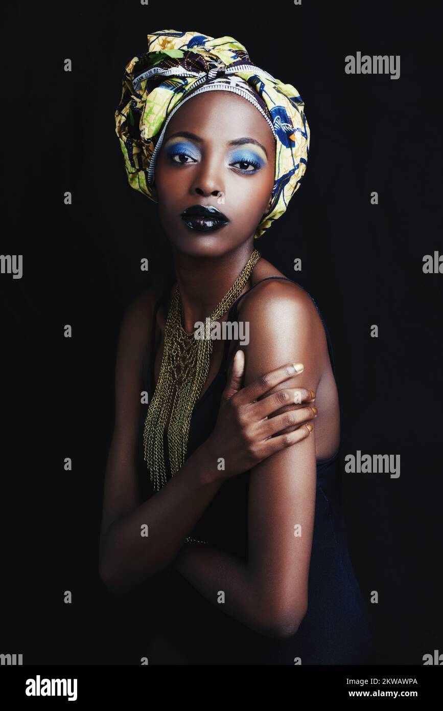 Shes A True African Beauty A Beautiful African Woman Posing Against A Black Background Stock
