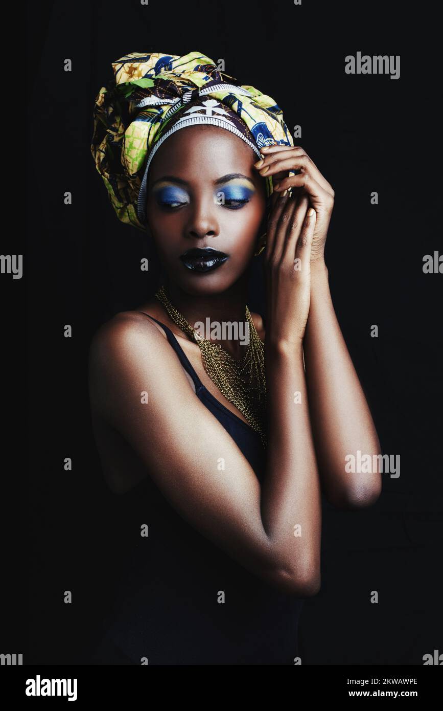 Shes A True African Beauty A Beautiful African Woman Posing Against A