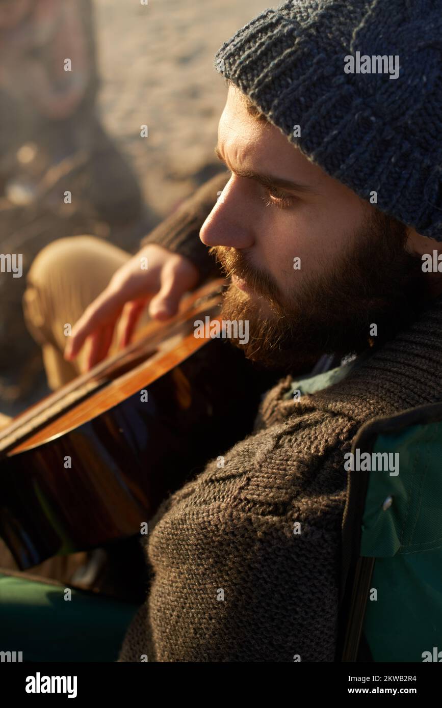 Alone man playing on guitar hi-res stock photography and images - Alamy