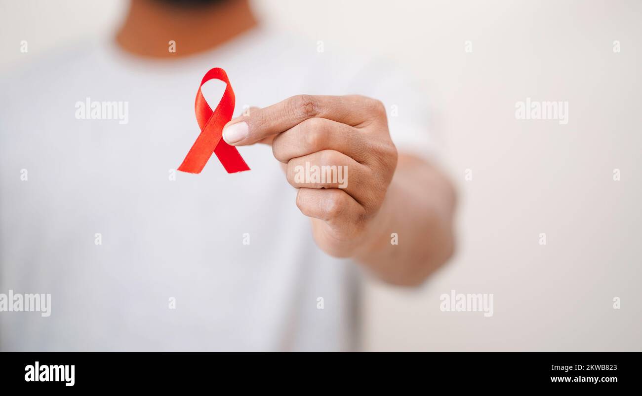 Worlds HIV Aids Day, Men Holding A red ribbon In his hand, HIV Aids ...