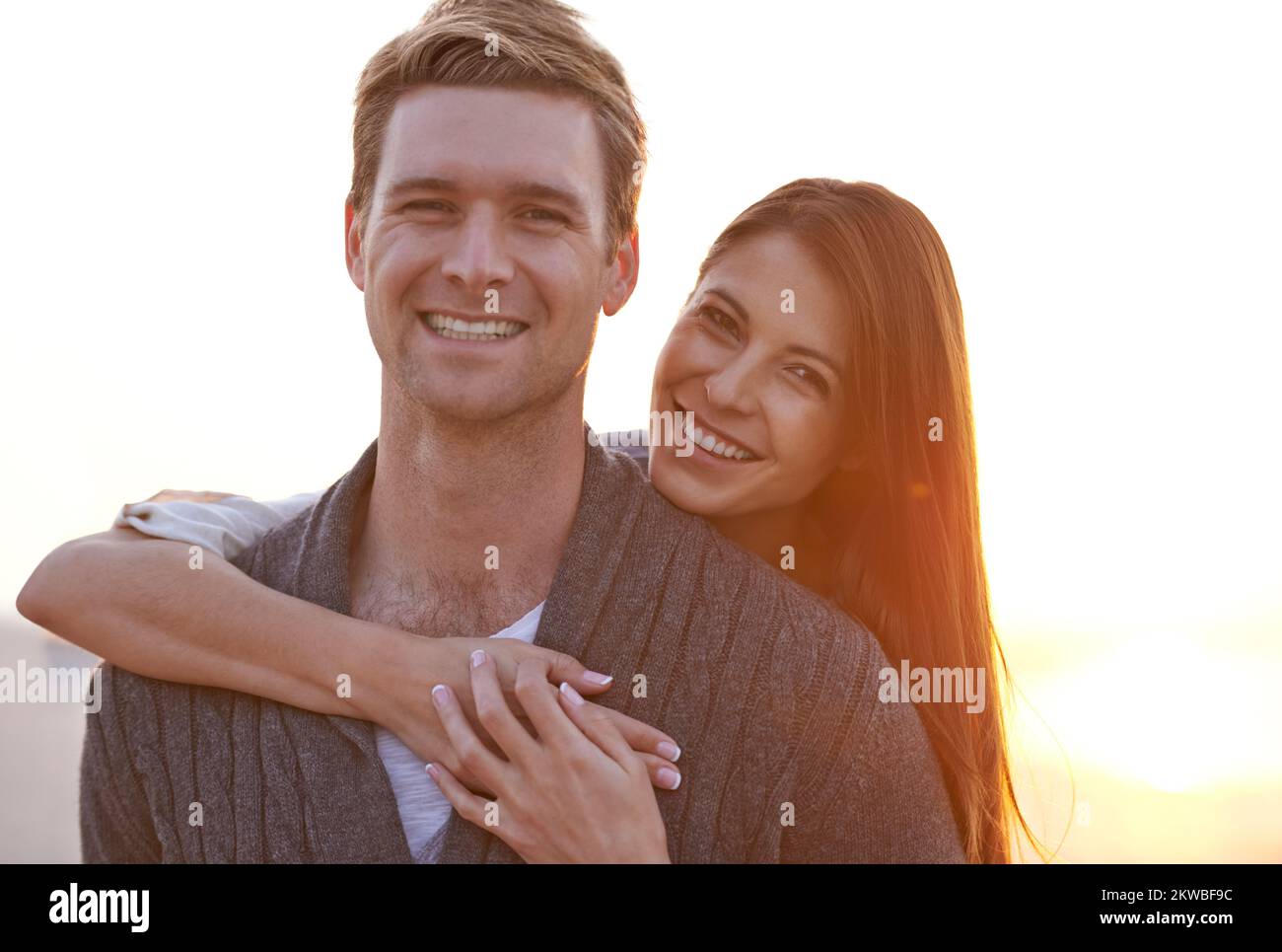 Theres nothing like young love. A young couple enjoying a romantic moment together at the beach ...