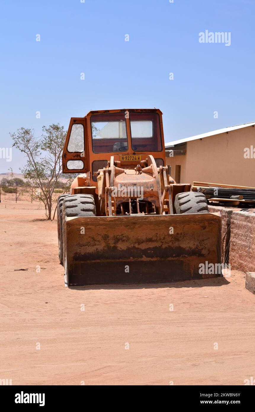 Old dusty Big Wheel loader Caterpillar Namibia Afrika Stock Photo - Alamy