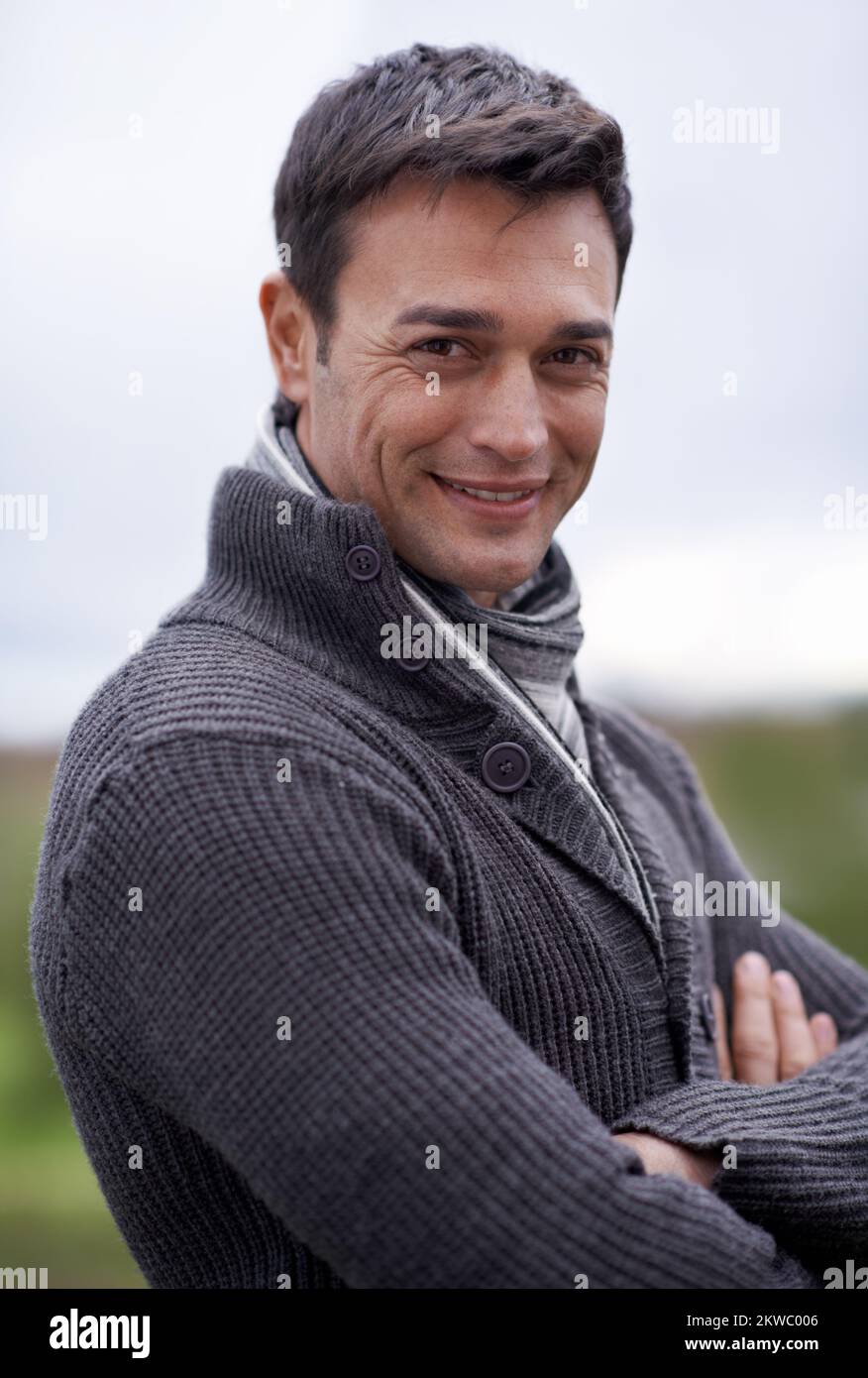 Handsome brunette man standing hi-res stock photography and images - Alamy