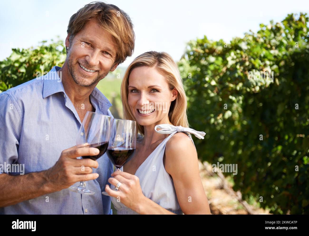 Wine is more like a passion of ours...Portrait of a couple enjoying ...