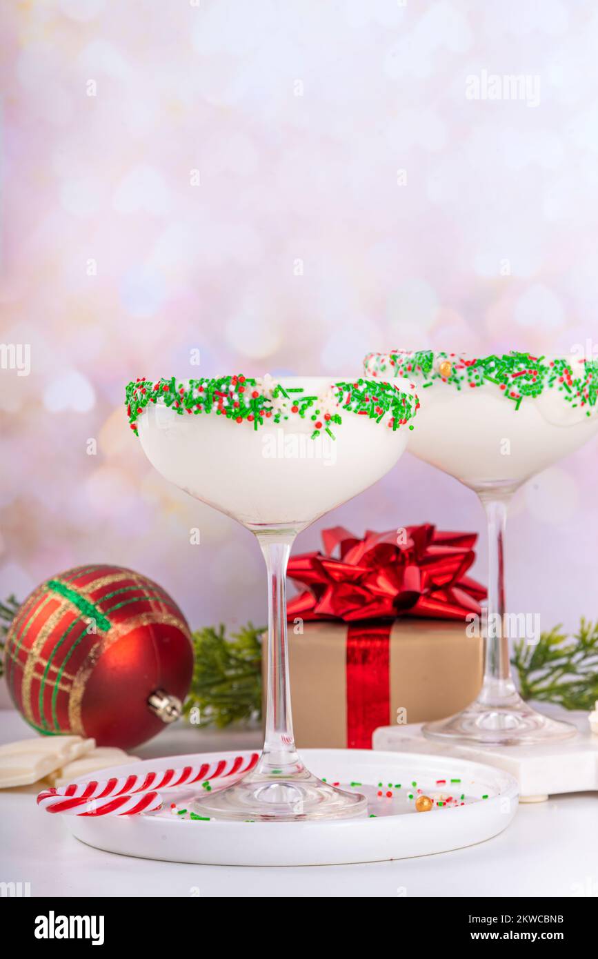 White sugar cookie martini with festive sprinkles rim. Christmas New ...