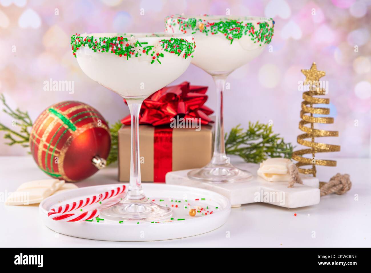 White sugar cookie martini with festive sprinkles rim. Christmas New ...