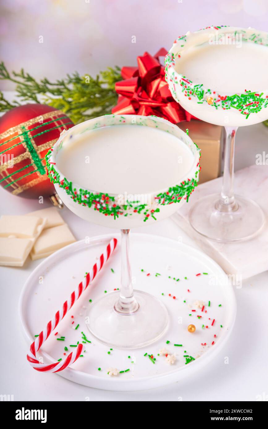 White sugar cookie martini with festive sprinkles rim. Christmas New ...