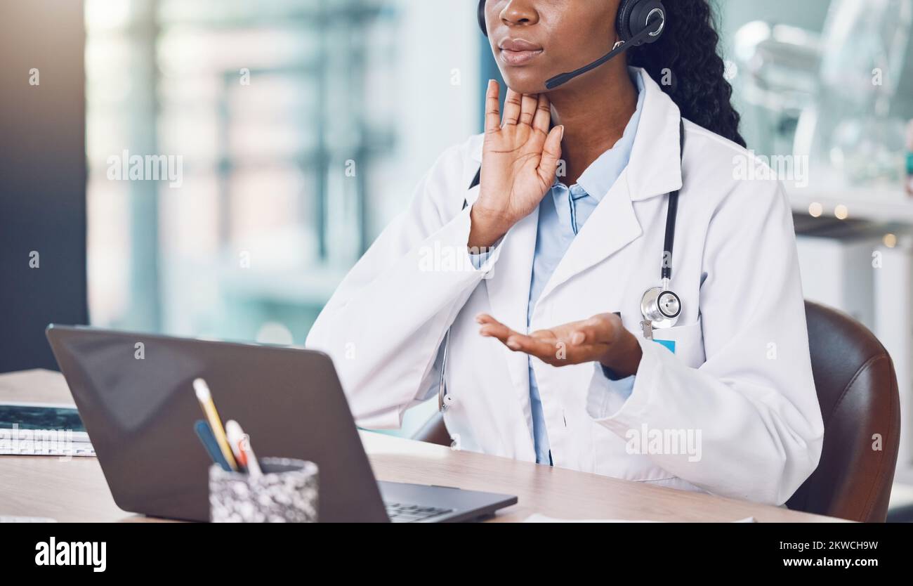 Doctor, video call and telehealth on laptop consulting online in her ...