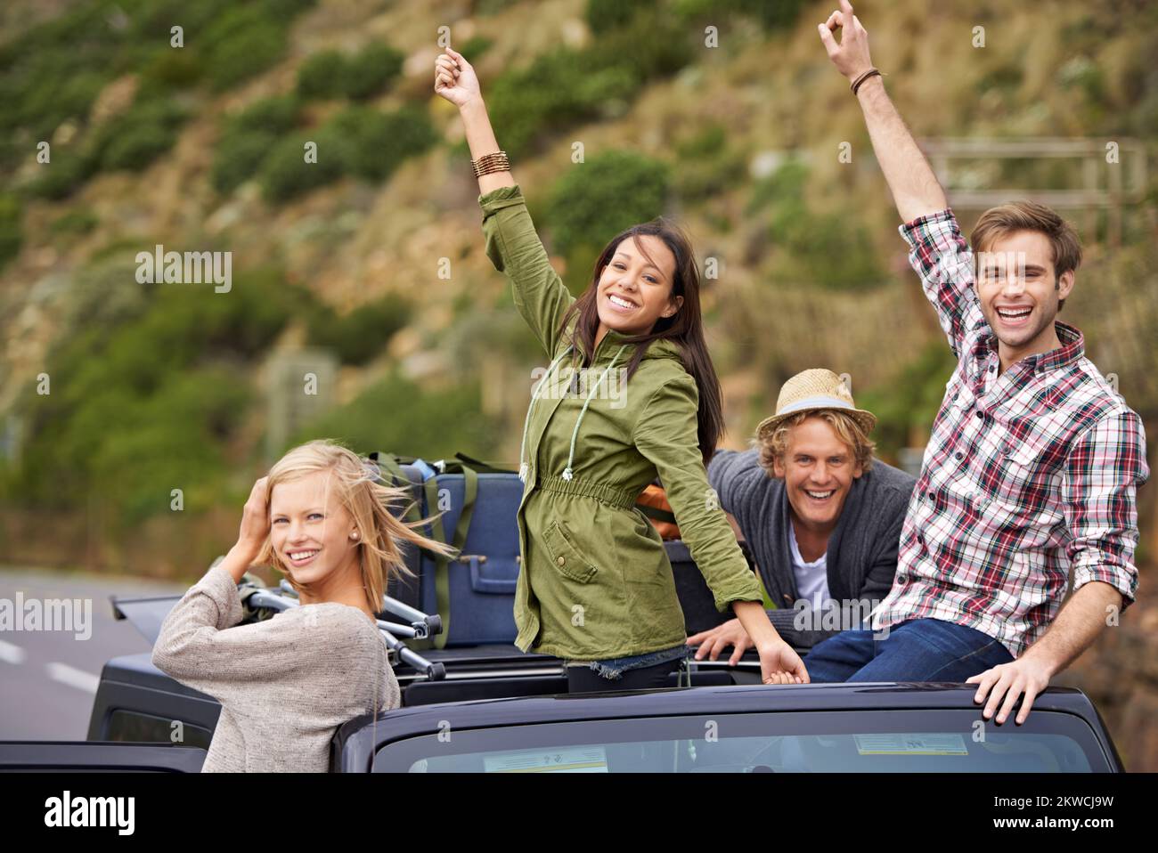 Dancing to the beat of natures drum. a young group of friends enjoying ...
