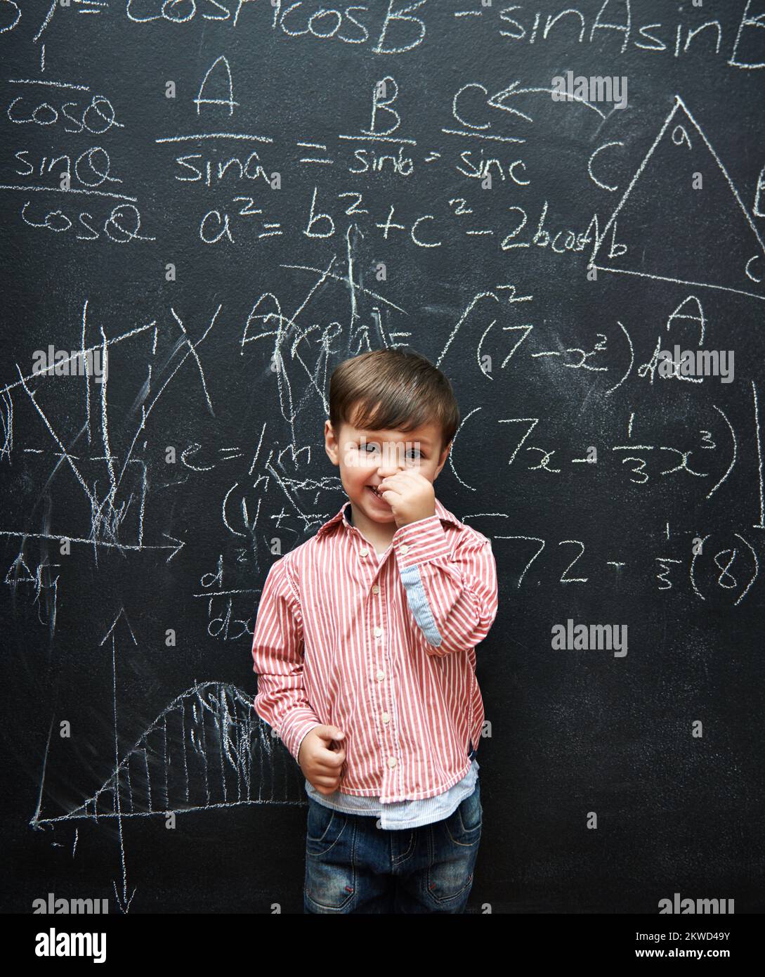 This I did this in five minutes. a young boy with a blackboard full of ...