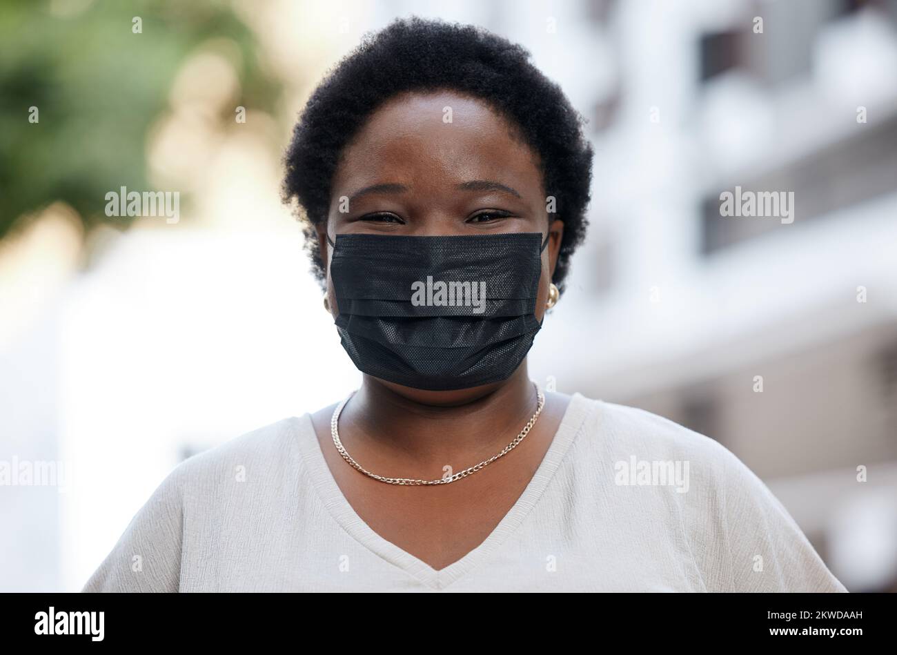 Covid, face and safety mask of a happy black woman corona protection ...