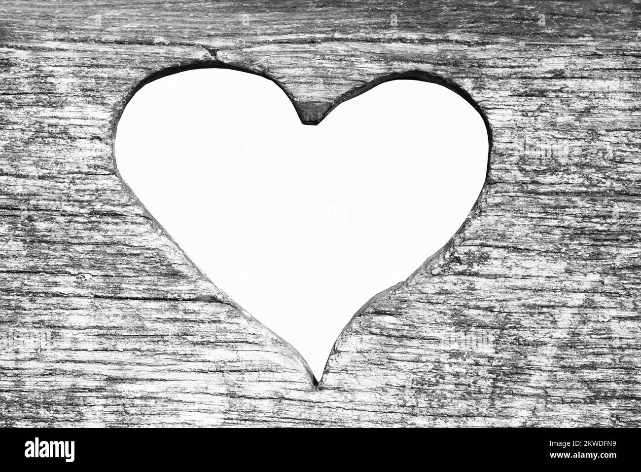 Heart carved in wood Stock Photo - Alamy