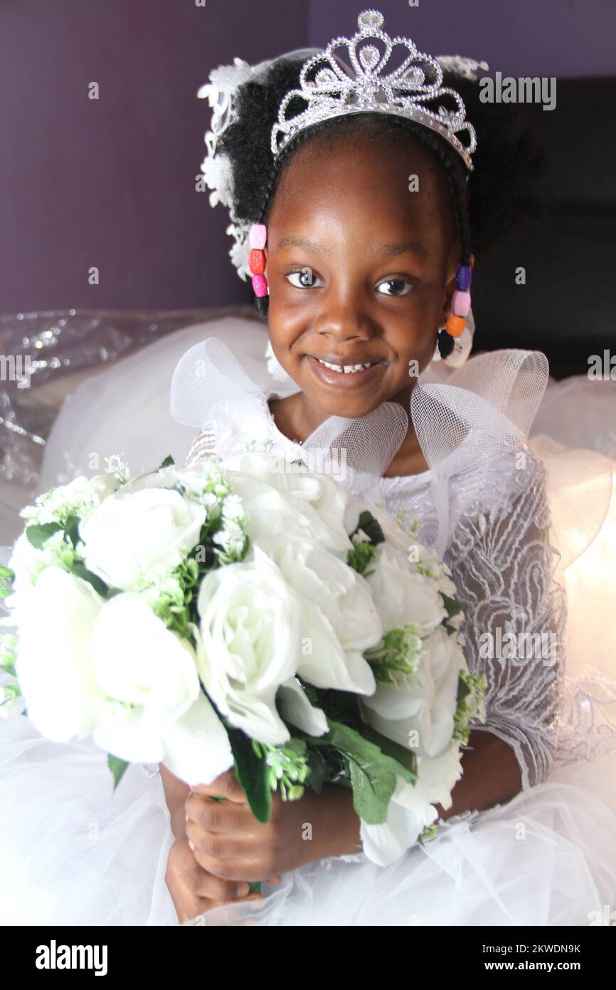 A little pretty bride in white gown Stock Photo - Alamy