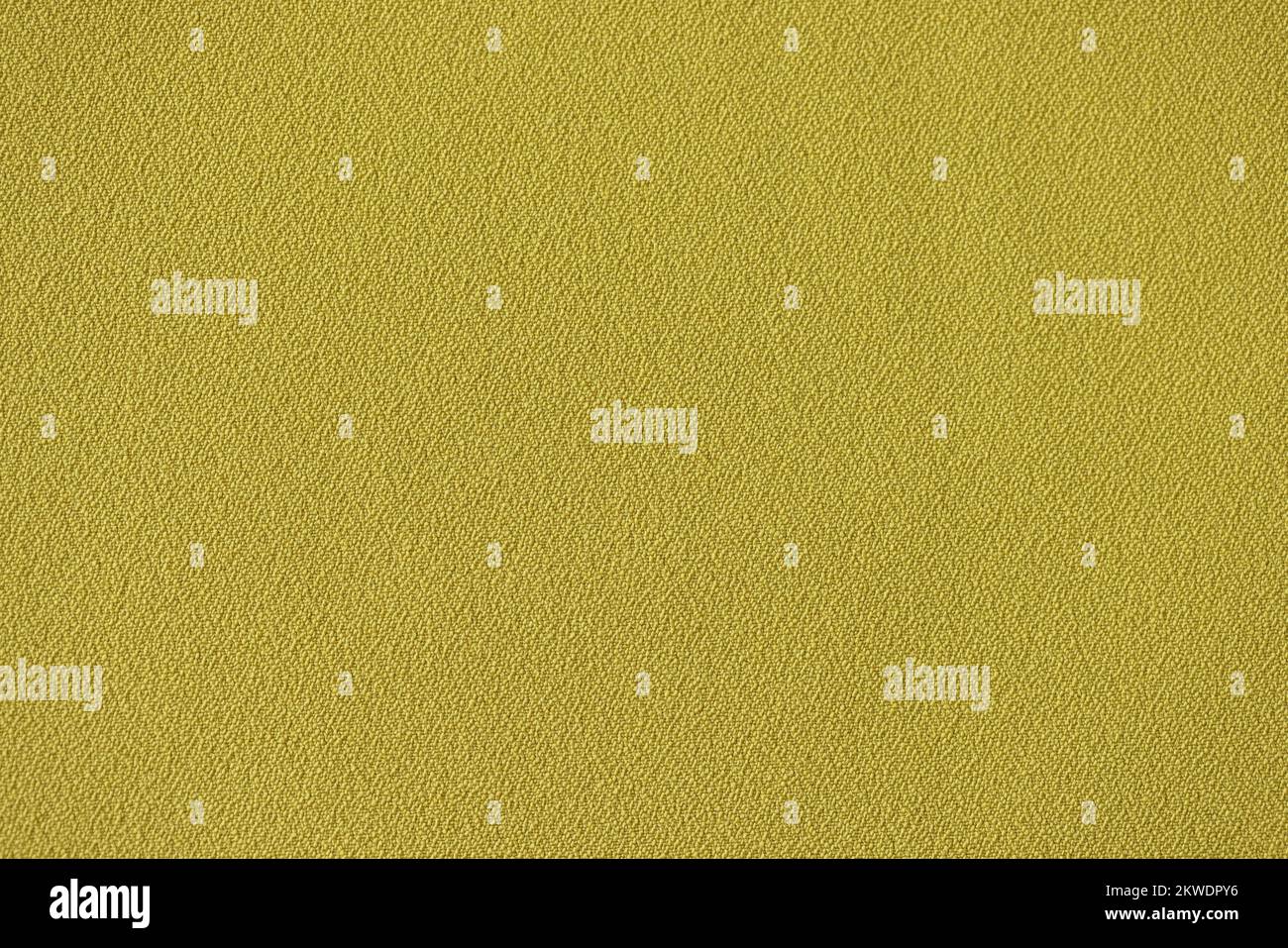 Yellow single color rough fabric background Stock Photo - Alamy