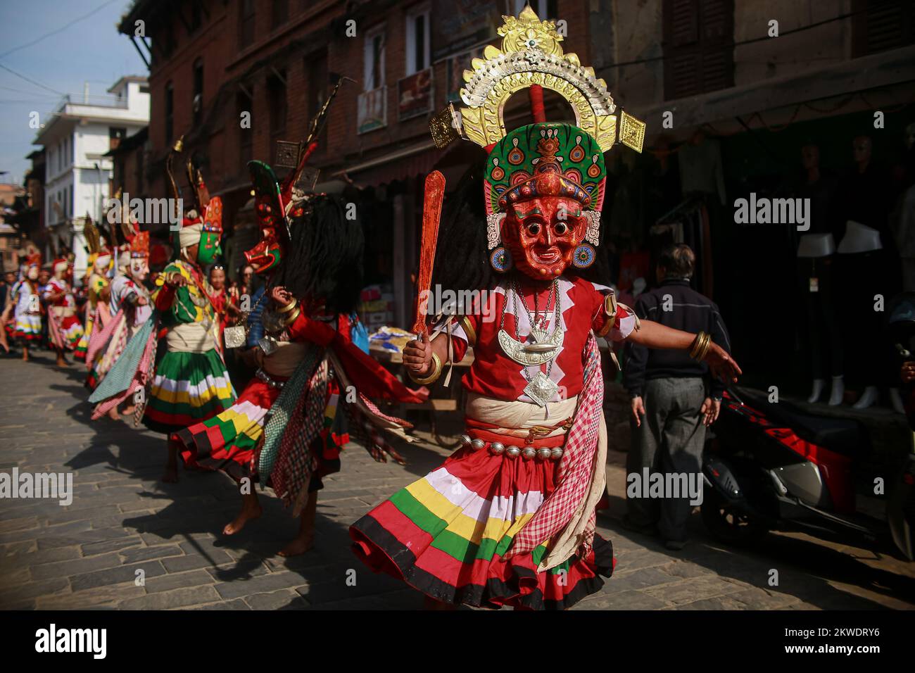Nepal. 30th Nov, 2022. A masked Nepalese people clad as a deity ...