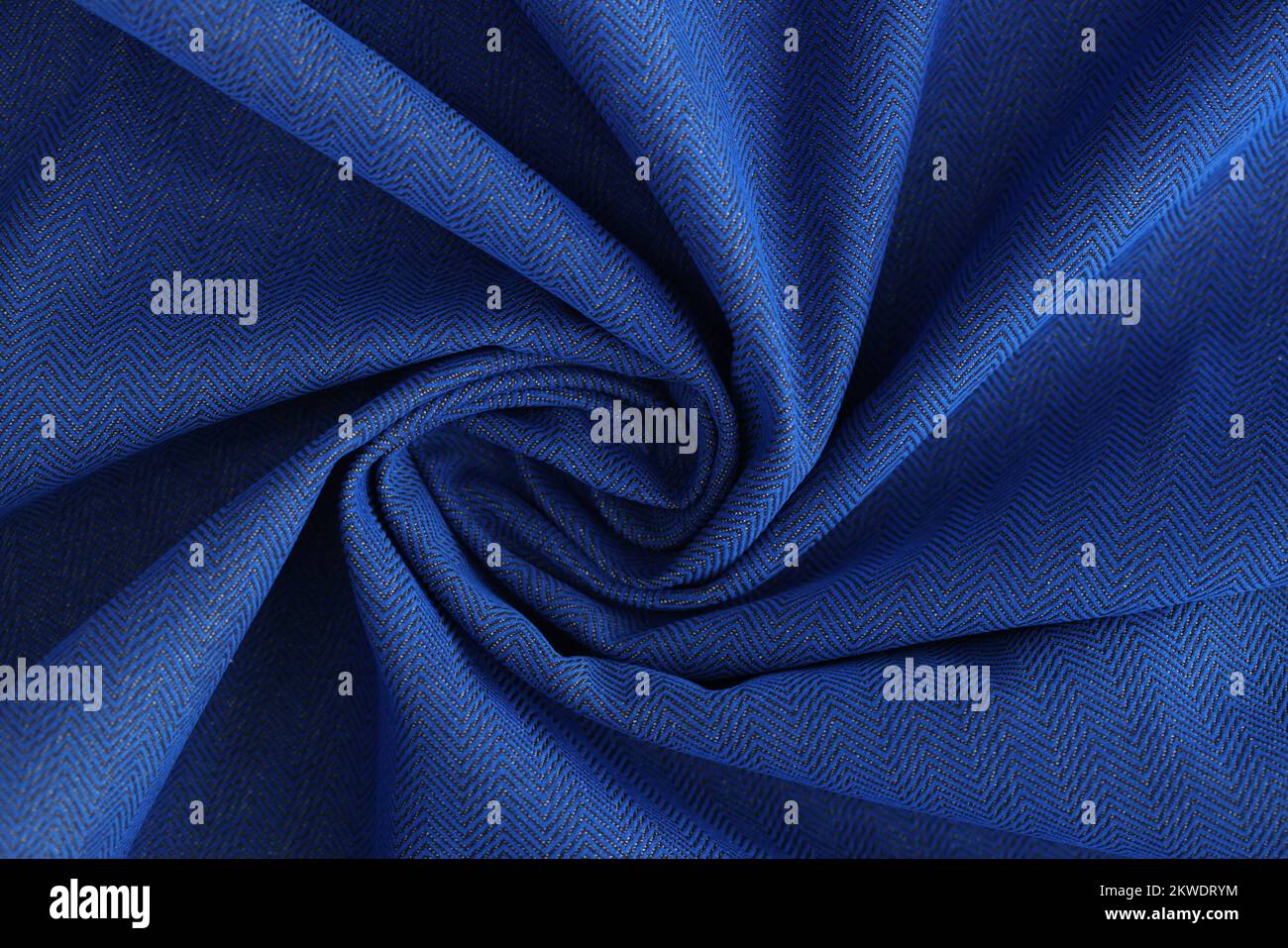 Shaped blue fabric background or design element Stock Photo - Alamy