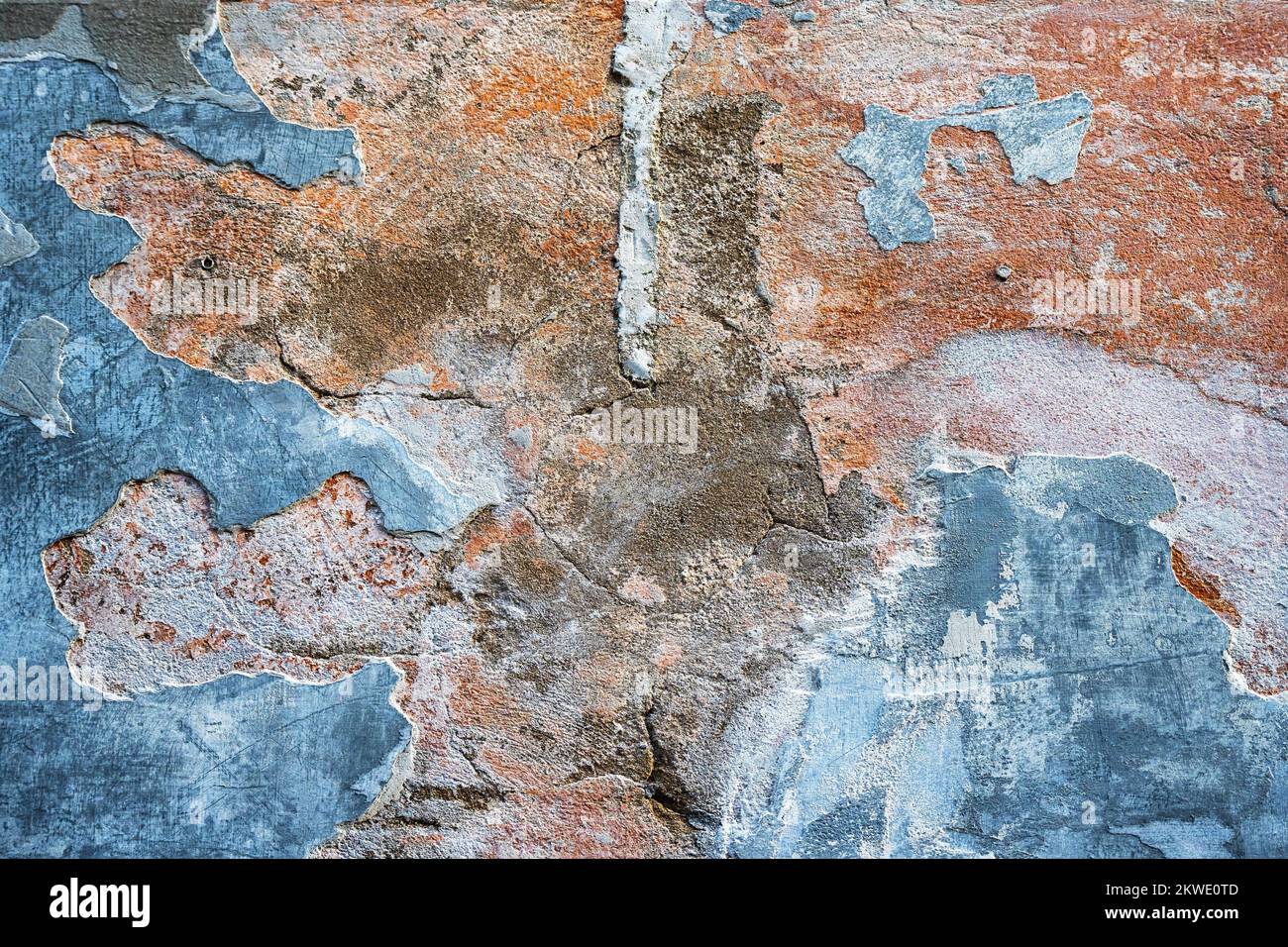 Old decaying plaster on the wall, nice stains in pastel color (blue ...