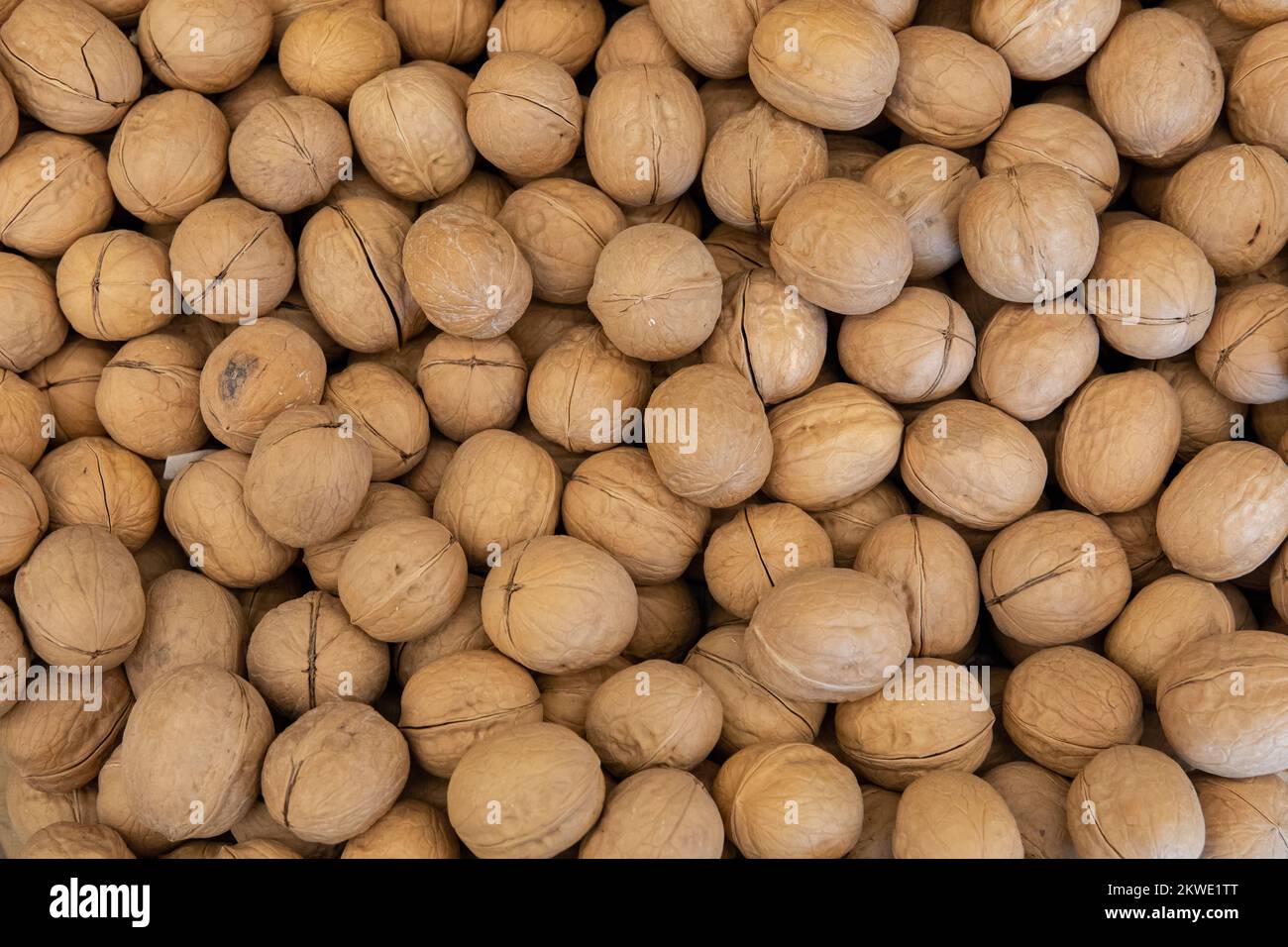 Natural organic walnut background pattern or texture Stock Photo - Alamy