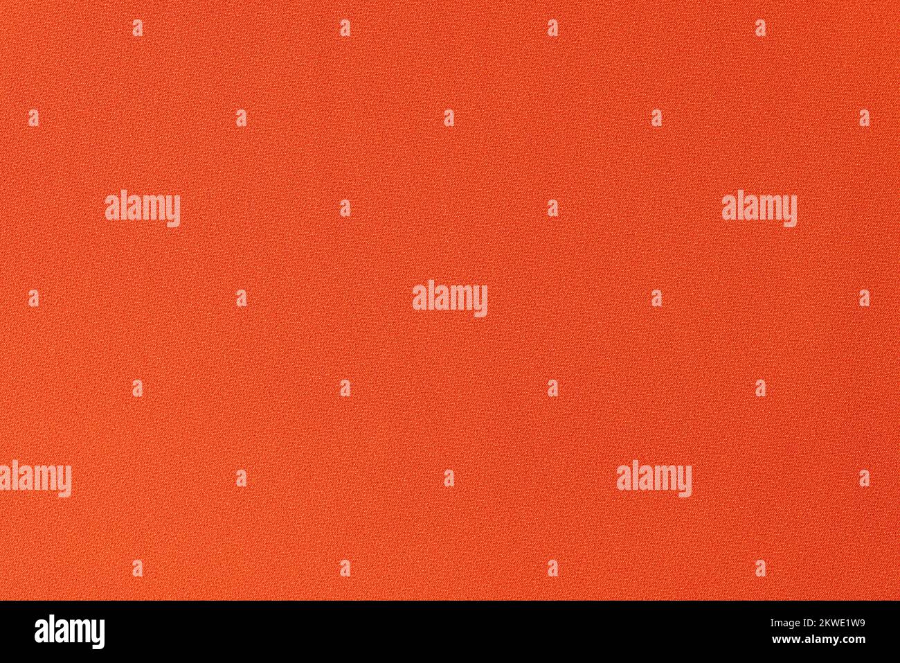 Unicolorous bright orange fabric as background Stock Photo - Alamy