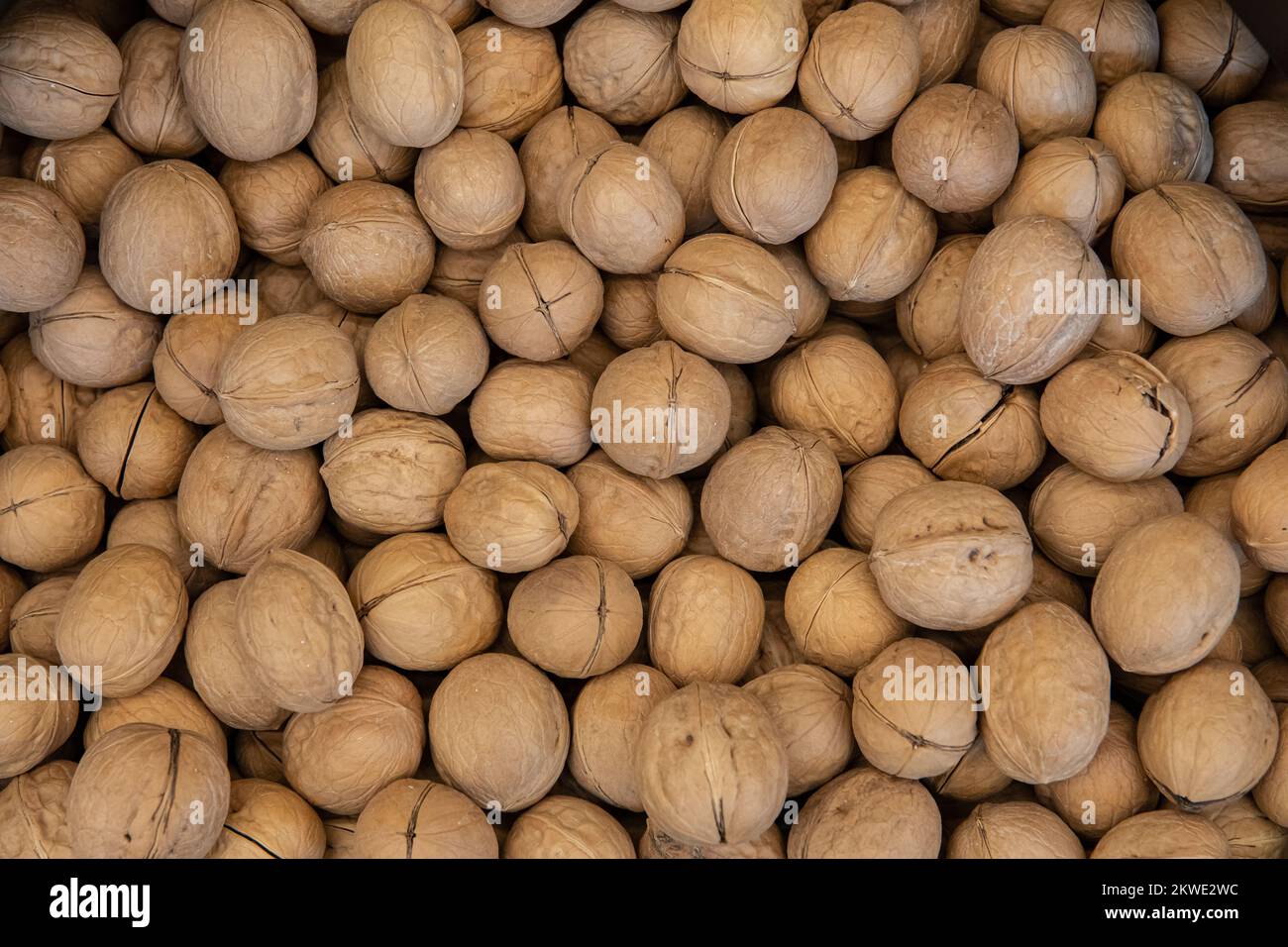 Natural organic walnut background pattern or texture Stock Photo - Alamy