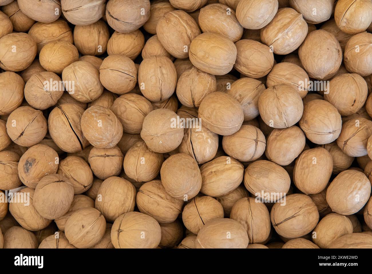 Natural organic walnut background pattern or texture Stock Photo - Alamy